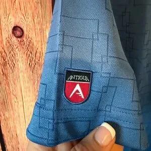 Antigua | Shirts | Antigua Mens Textured Blue Polo Golf Shirt With Logo ...